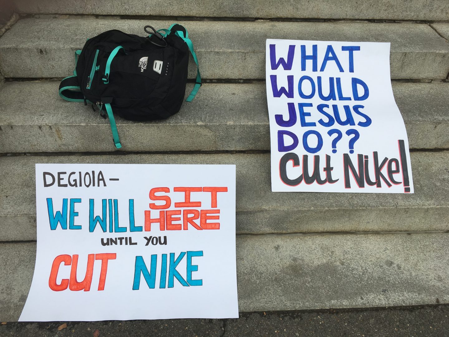 Nike protest signs, Healy steps - The Georgetown Voice