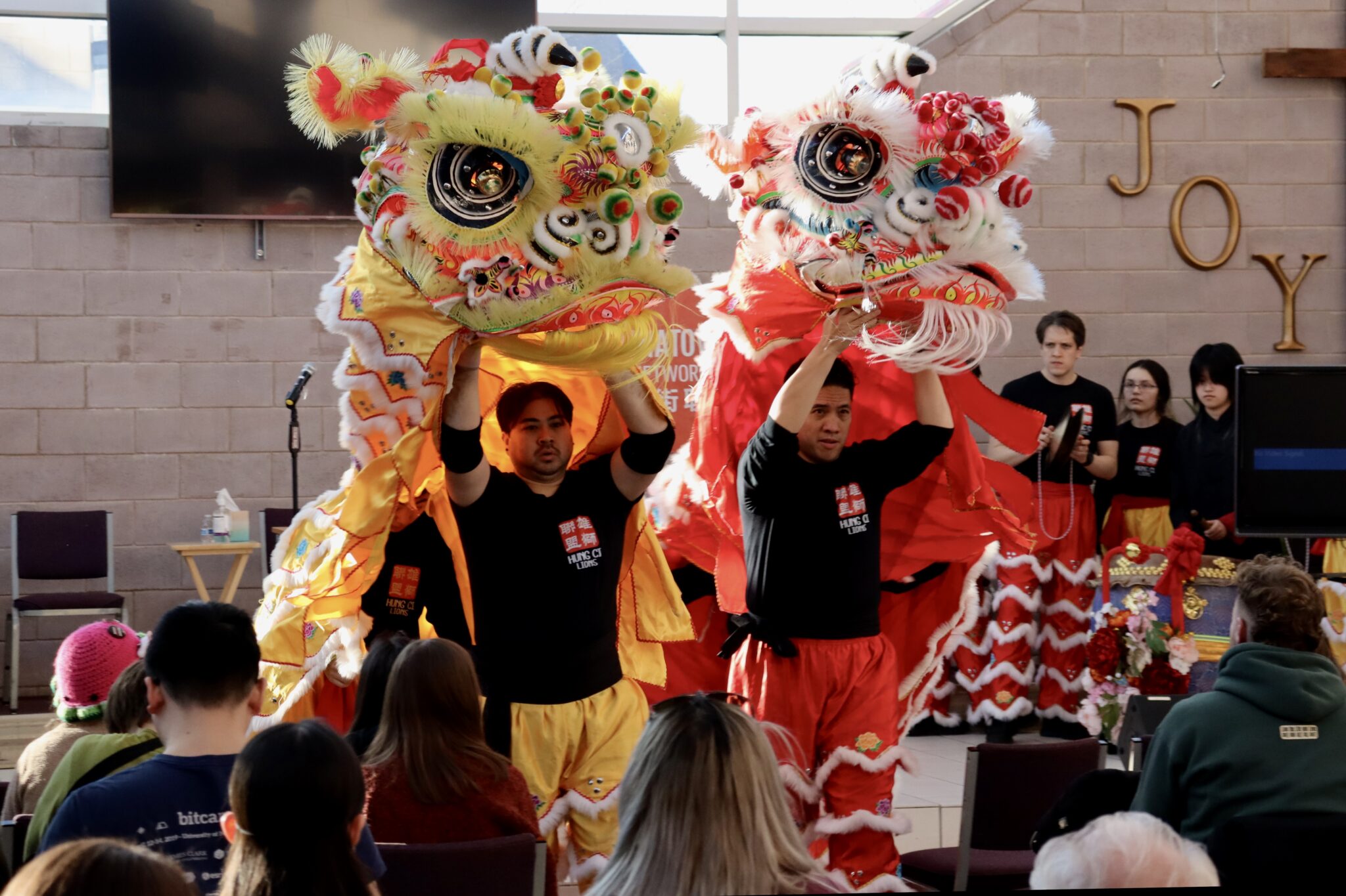 Photo by Katie Doran The Hung Ci Lion Dance Troupe performs a lion ...